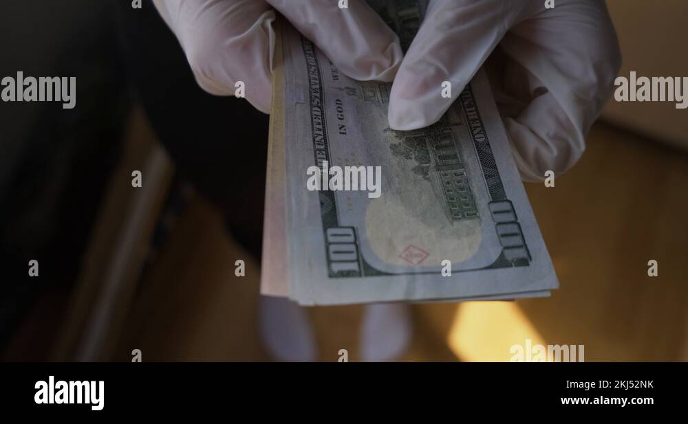 Hands are calculating cash balances due to pandemic. money carrier of ...