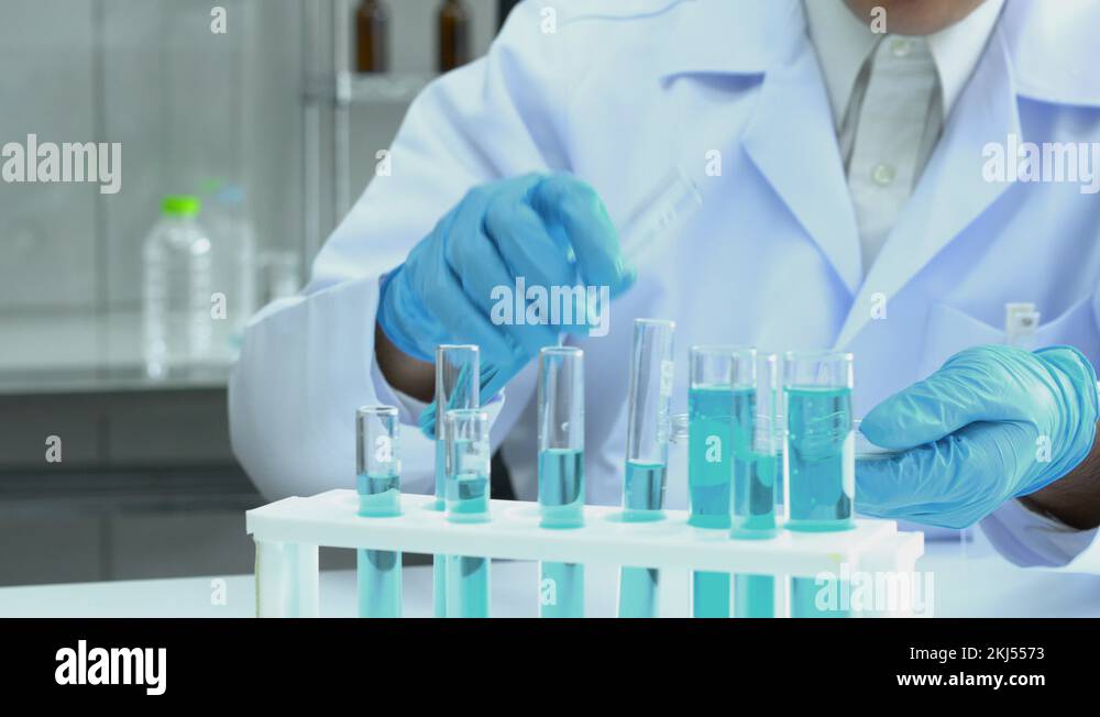 Scientist experimenting chemicals in science laboratory Stock Video ...