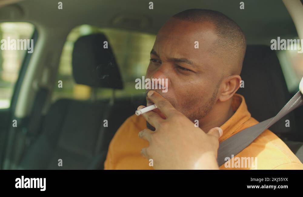 Man smoking cigarette on roadside Stock Videos & Footage - HD and 4K ...