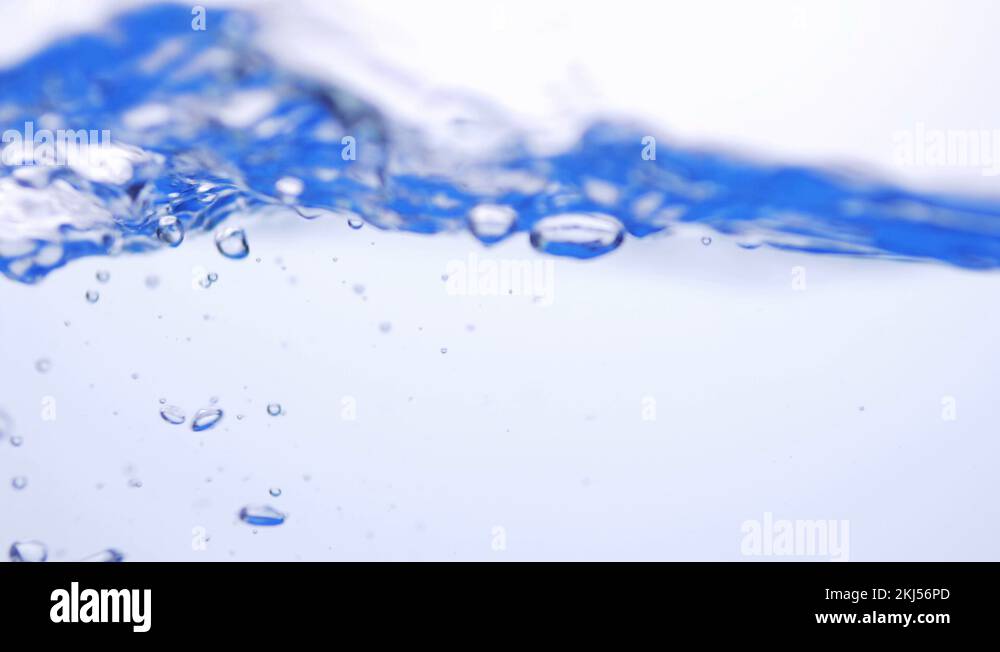 Water splash surface filling the frame with the water drop and waving ...