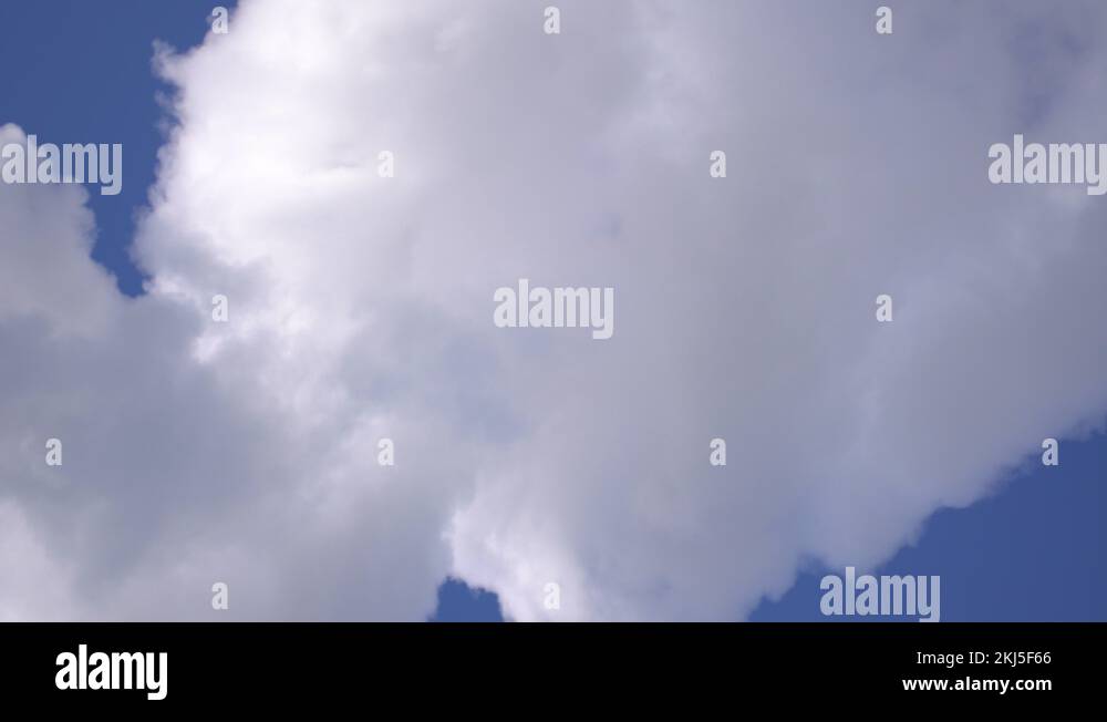 Smoke abstract. Smoke cloud. Smoke on blu background in sun light ...
