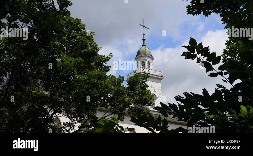 Kirtland Ohio LDS Temple spire through trees moving clouds 4K Stock ...