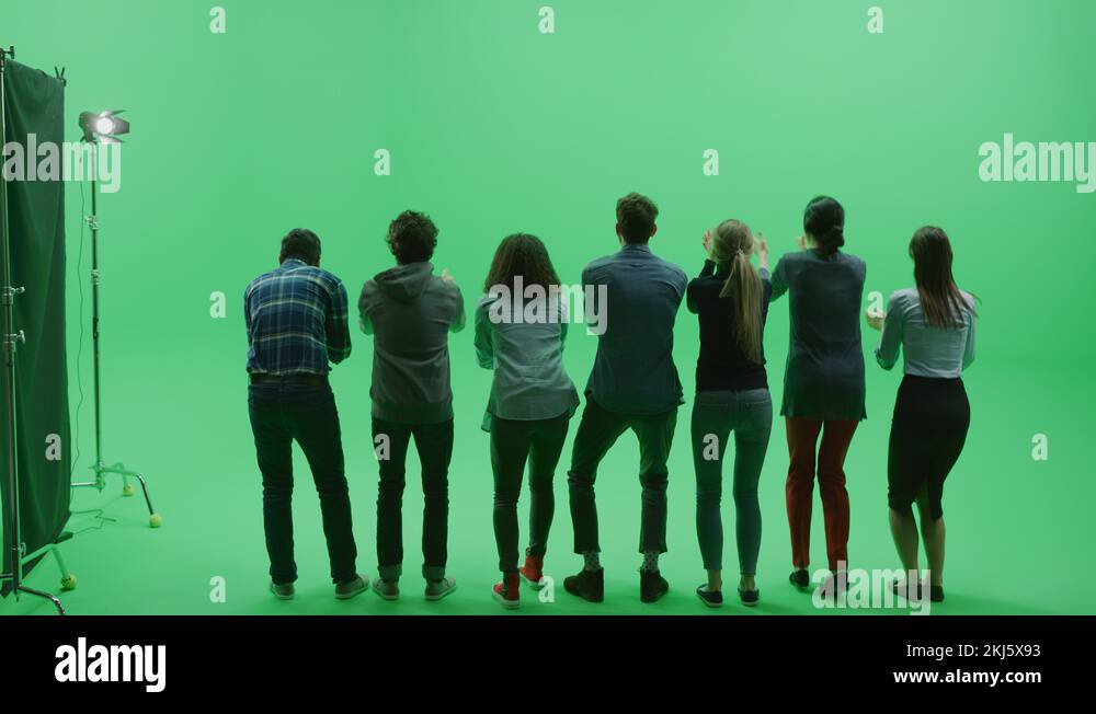 Green Screen Chroma Key Studio: Diverse Row of Seven Fans Cheering ...