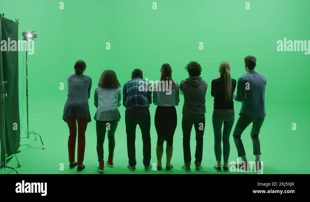 Green Screen Chroma Key Studio: Row of Seven People / Fans Cheering ...