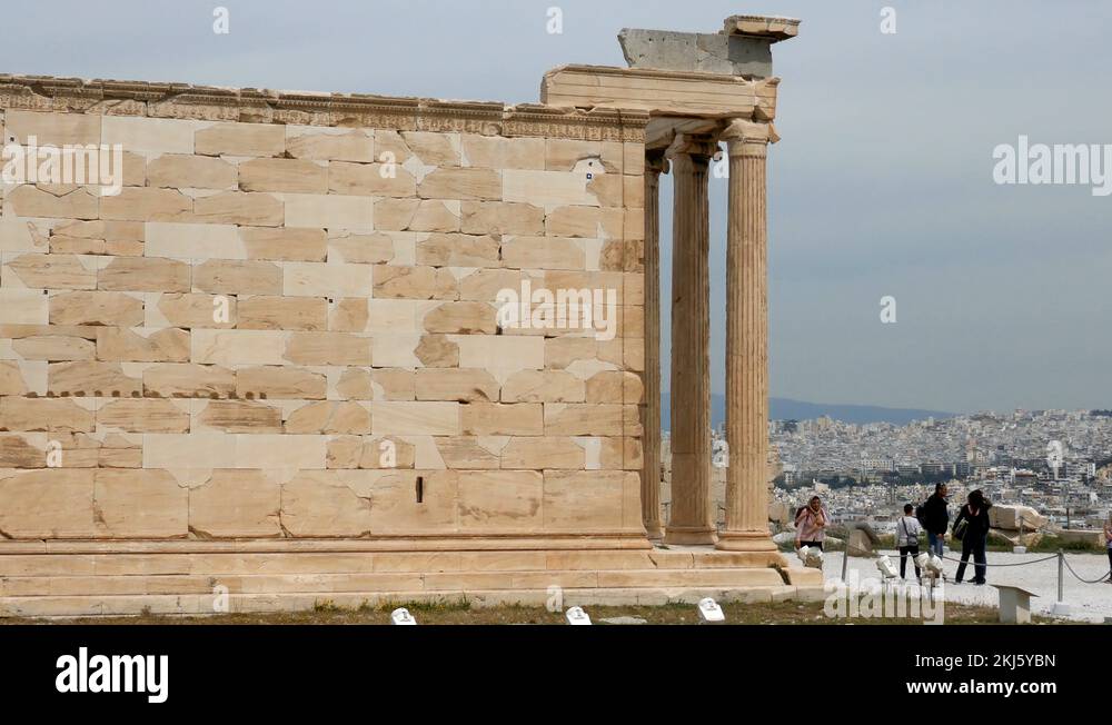 Right to left pan from temple of Athena Acropolis of Athens to city of ...