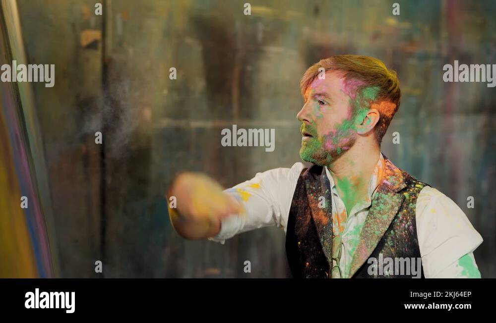 the artist paints dry paintings by throwing a painting Stock Video ...