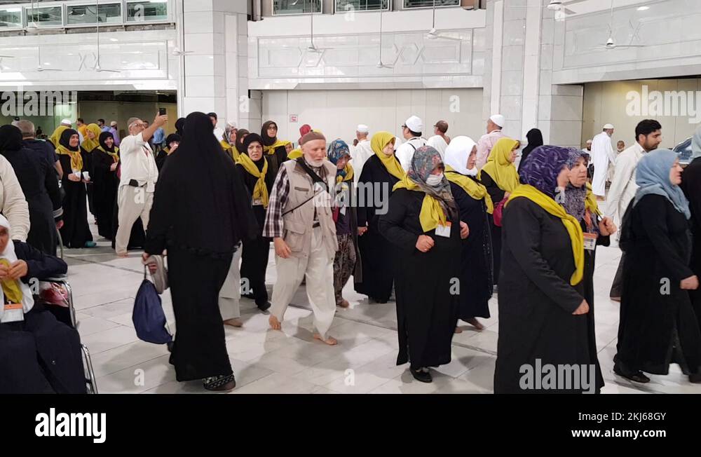 Muslim pilgrims circumambulate the Kaaba at the indoor of masjid haram ...