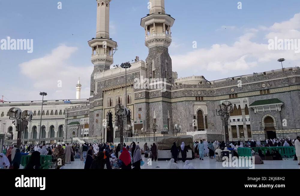 Mecca, Saudi Arabia : Prayers walk in the outer yard of the Grand ...