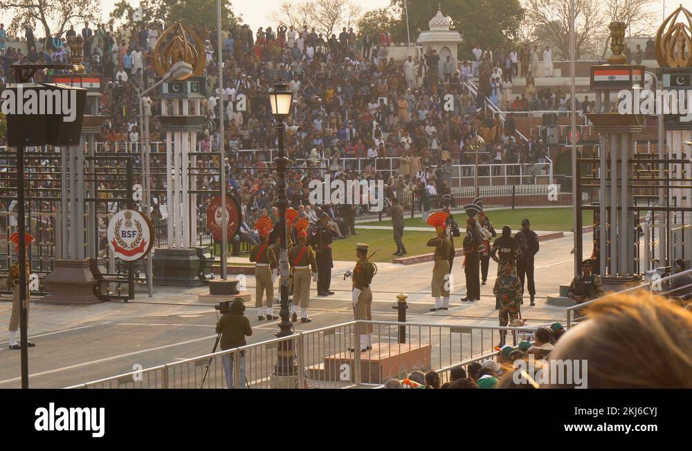Indian and Pakistani Border Soldiers in Uiforms Performing Flag ...