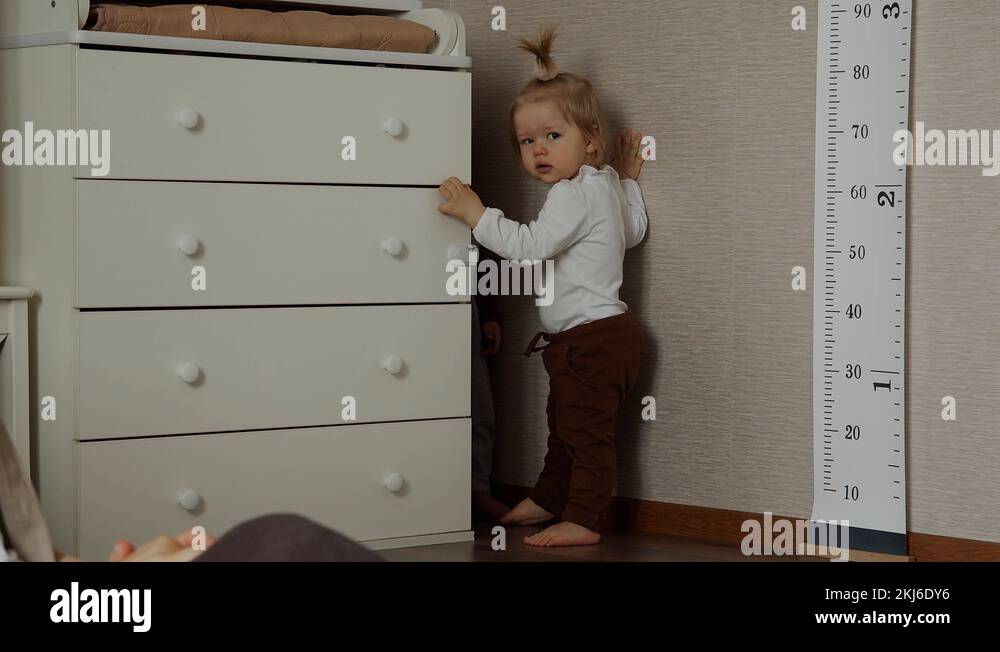 Little twins play at home. Children talking. Boy and girl have fun ...