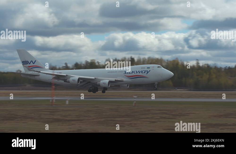 heavy cargo airplane boeing 747 silkway slow motion landing touchdown ...