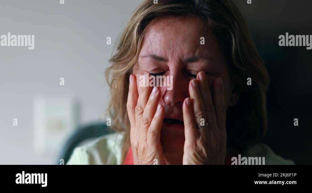 Worried older woman portrait feeling anxiety. Senior woman in 60s ...