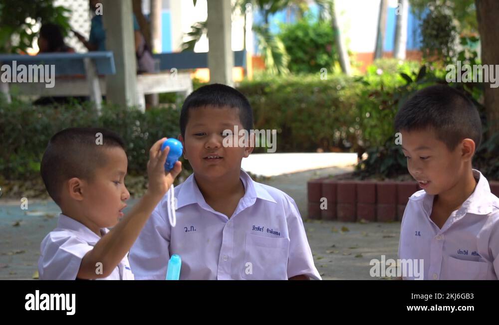 Asian boys playing in backyard Stock Videos & Footage - HD and 4K Video Clips - Alamy