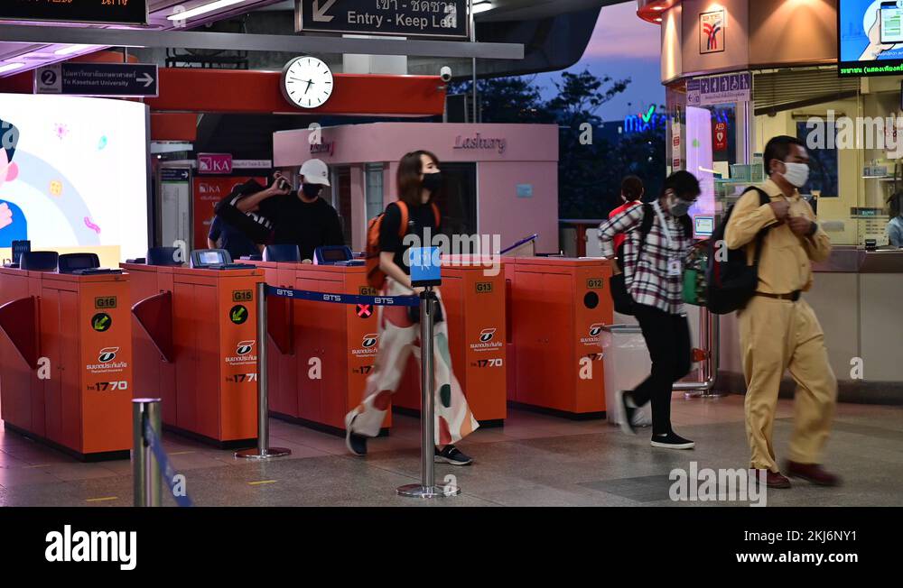 4K Many people wearing face masks in ticket gate inside a metro train ...