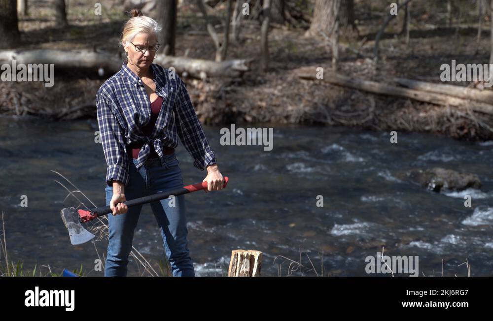 Woman splitting firewood Stock Videos & Footage - HD and 4K Video Clips ...