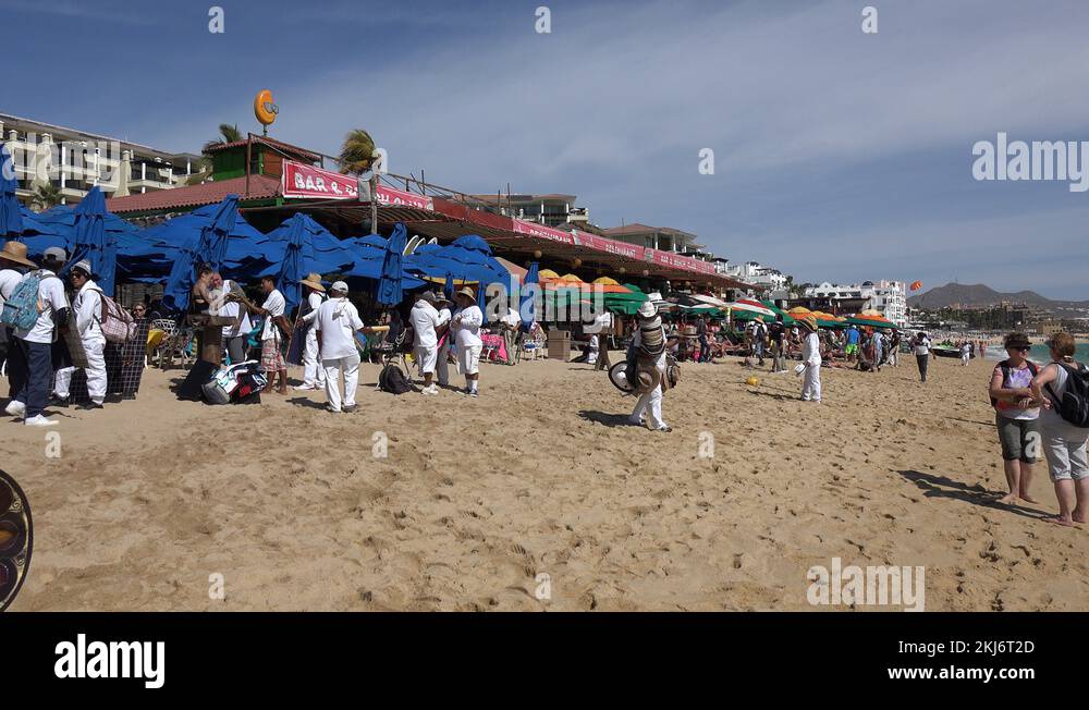 CABO SAN LUCAS MEXICO-2017: People Roaming In The Beach Man Selling ...