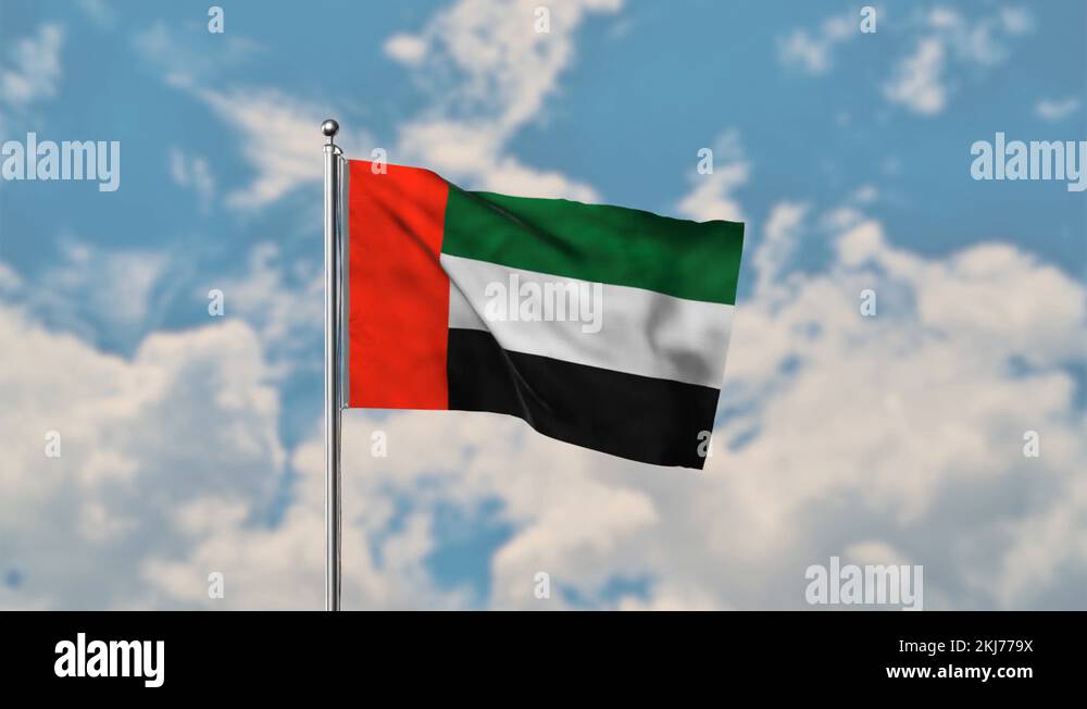 UAE flag waving in the sky, national symbol of UAE. UAE National Day ...