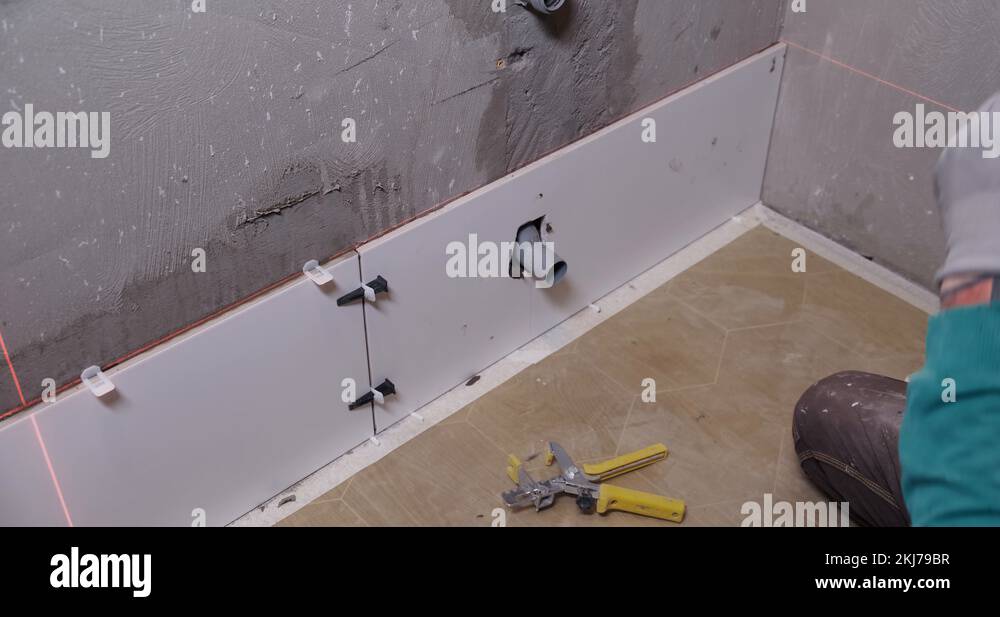 Laying of ceramic tiles Stock Videos & Footage - HD and 4K Video Clips ...