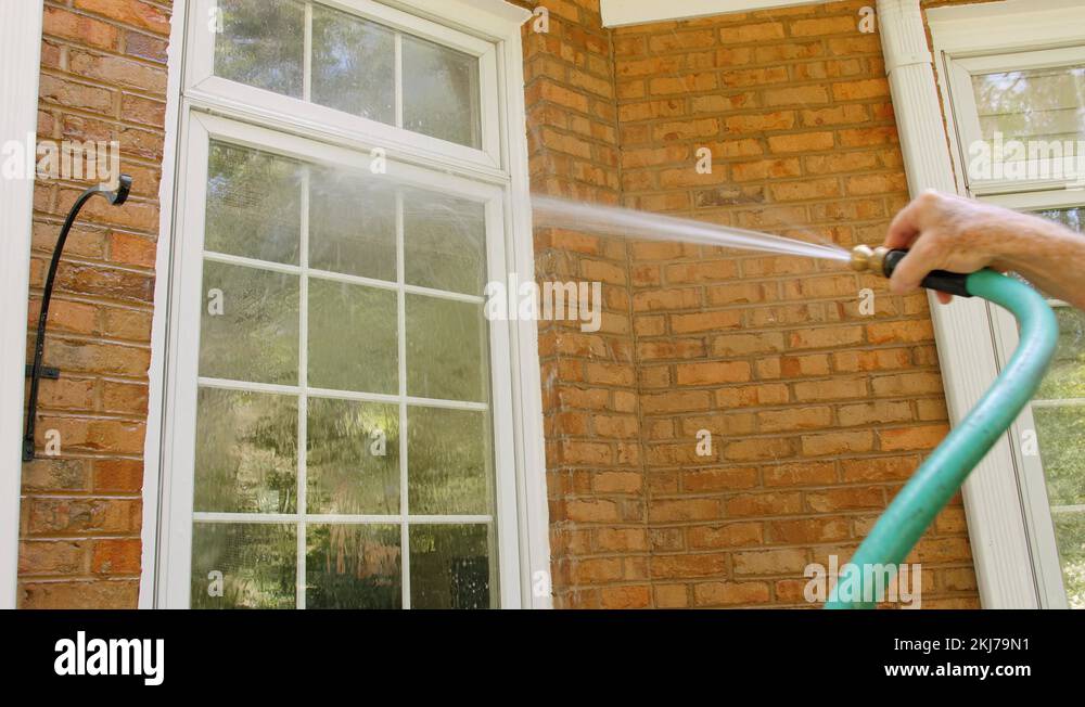 Washing windows house garden hose Stock Videos & Footage - HD and 4K ...