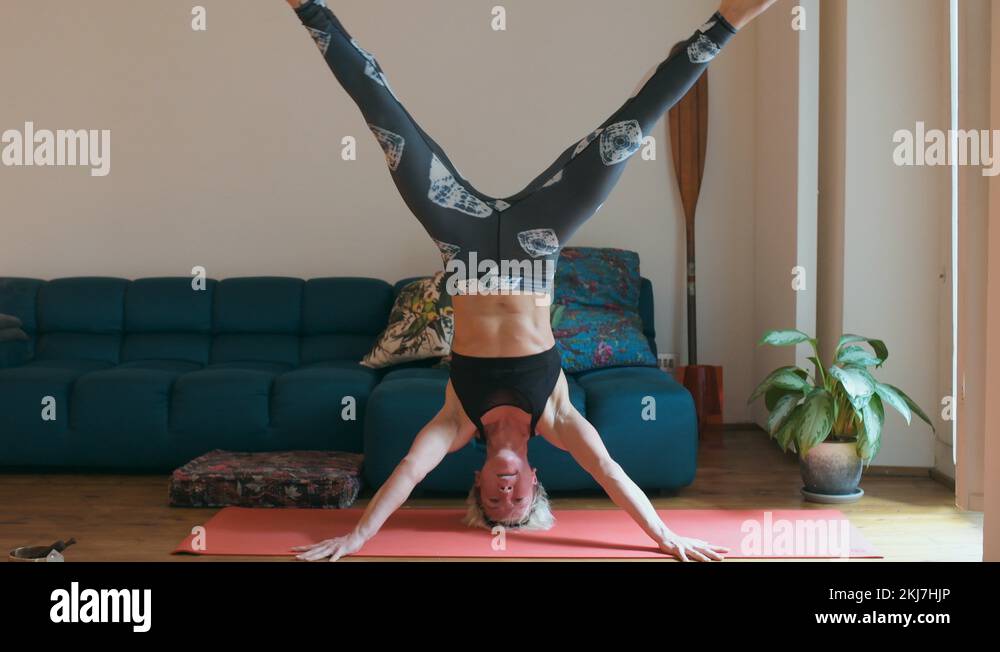 Doing headstand Stock Videos & Footage - HD and 4K Video Clips - Alamy