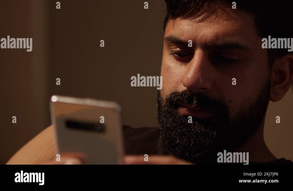 Man Scrolling on Phone Rubs Tired Eyes at Night. Static Close Up Stock Video Footage - Alamy