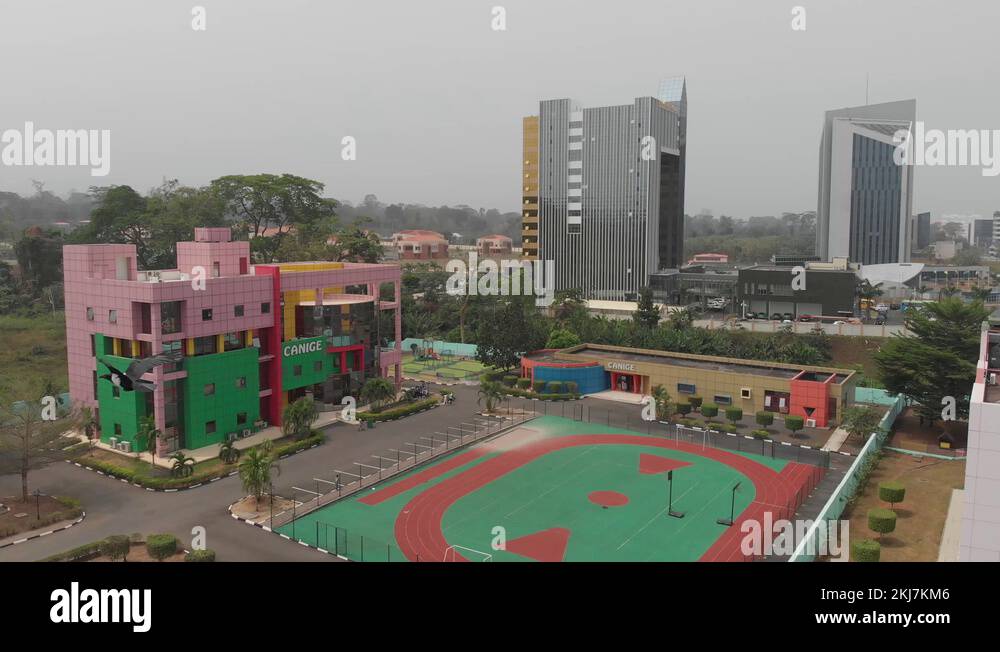 Modern school complex and skyscrapers in Malabo city, Equatorial Guinea ...