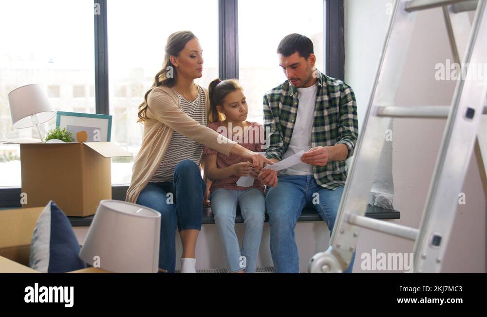 happy family with color palette moving to new home Stock Video Footage ...