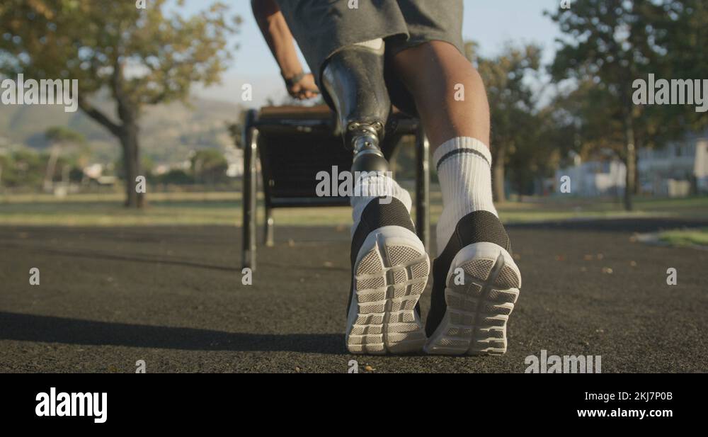 Low section view man with prosthetic leg stretching Stock Video Footage ...