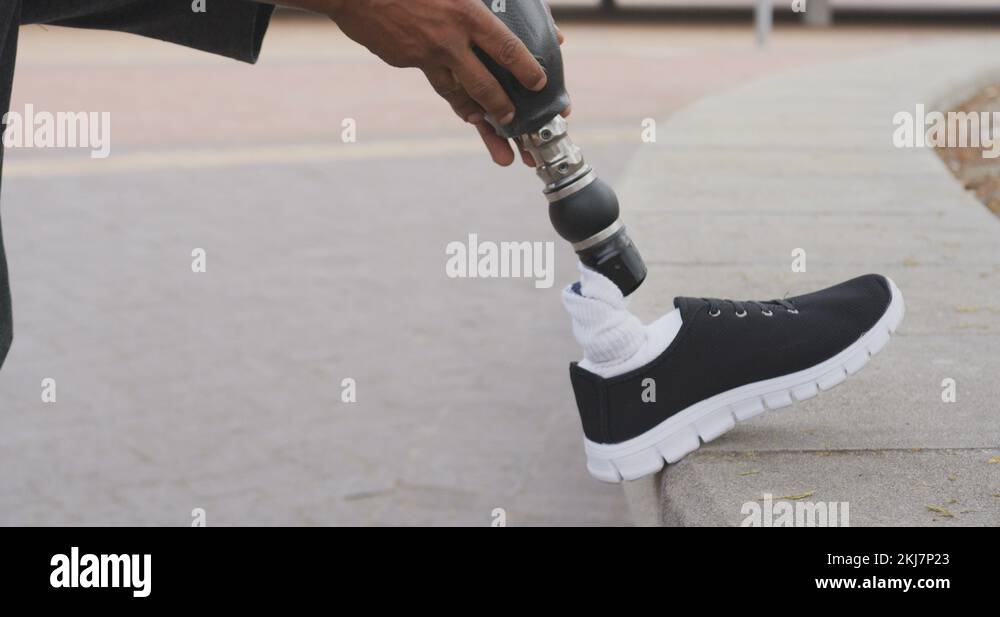 Side view man with prosthetic leg stretching Stock Video Footage - Alamy
