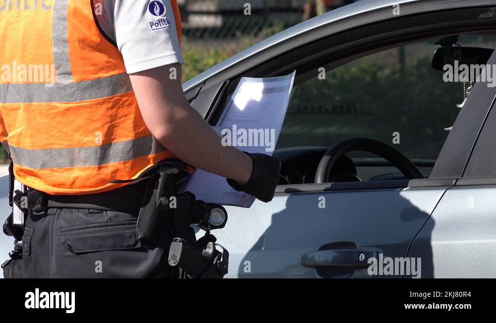 Police officer checks documents Stock Videos & Footage - HD and 4K ...