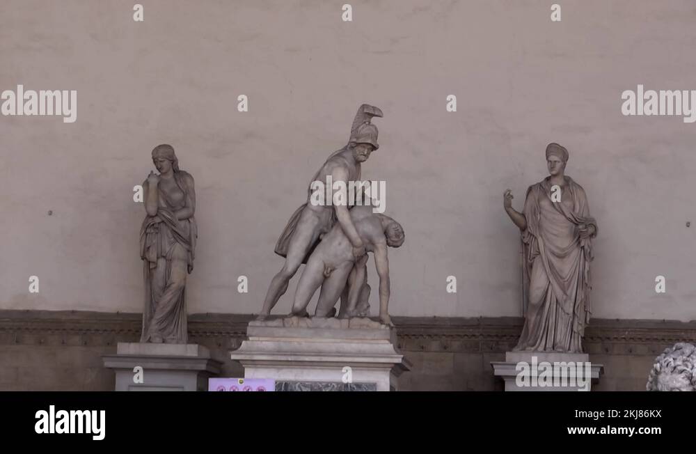 Statues in Florence in Italy under arcades Stock Video Footage - Alamy
