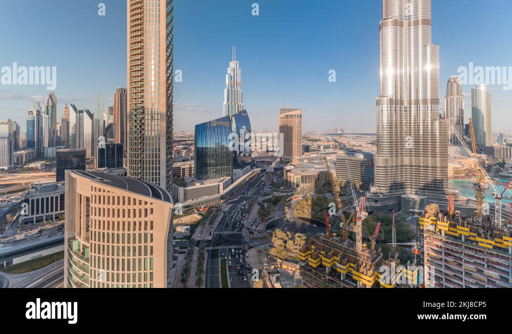 Panoramic skyline view of Dubai downtown with mall, fountains and ...