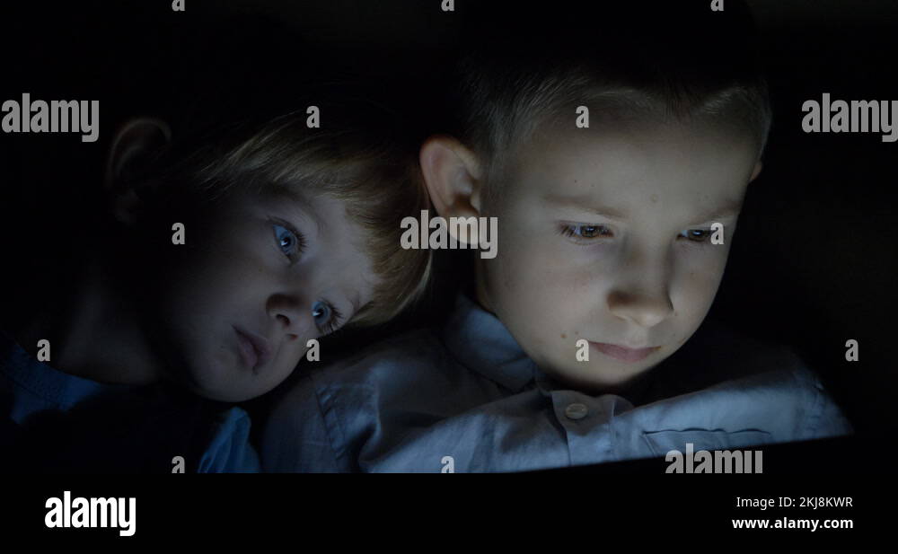 Portrait of child puts his chest on his brother's chest look together ...