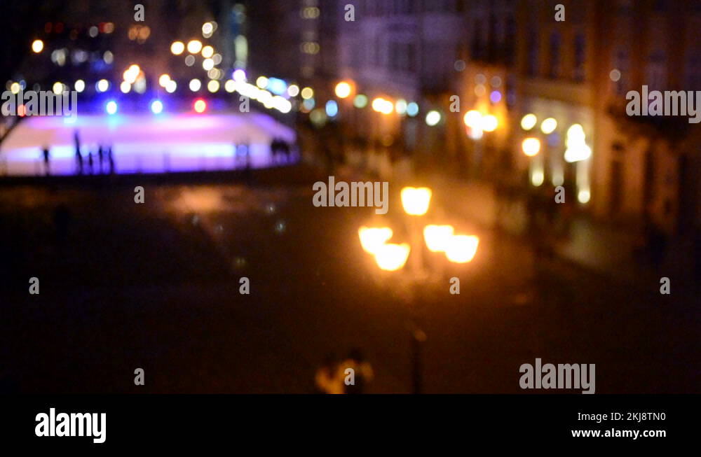 Blurred Background. Outdoor skating rink, open-air ice rink on square ...