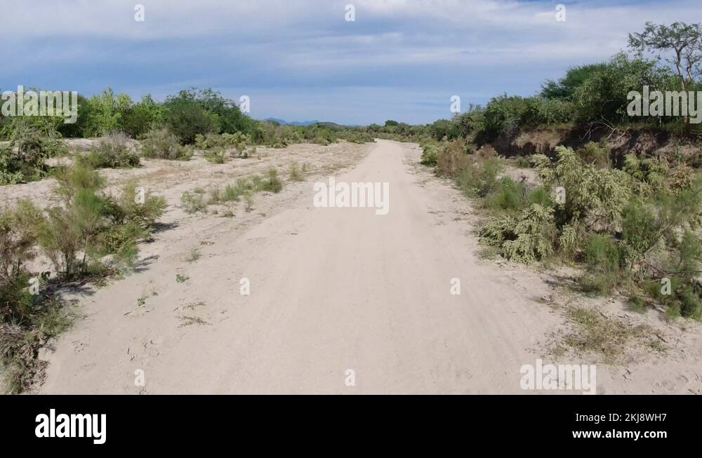 LOS CABOS MEXICO-2019: Driving Fast Through A Sandy Desert Area On A ...