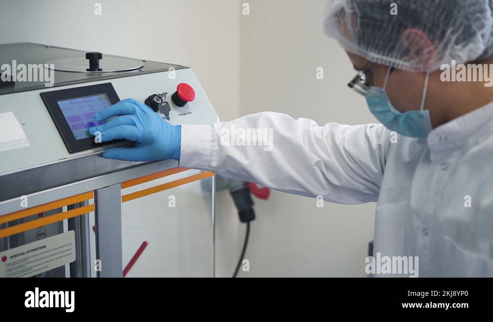 Process of making pills and male employee is in pharmaceutical ...