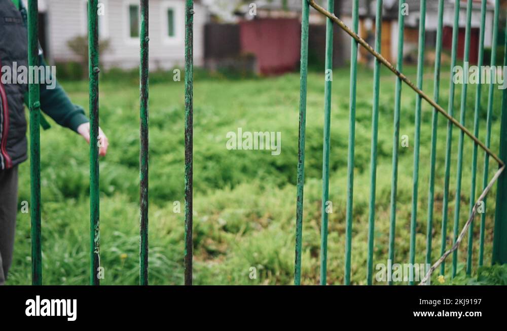 Hole in the metal fence Stock Videos & Footage - HD and 4K Video Clips ...