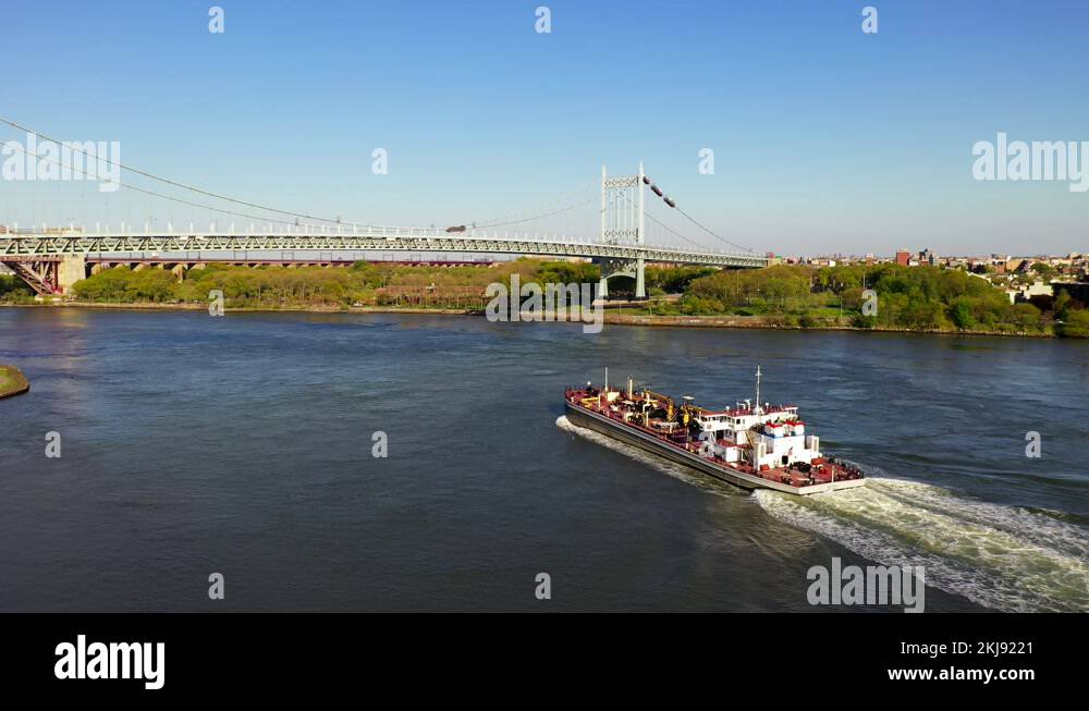 Aerial View of a Tanker Ship Approaching the RFK and Hell Gate Bridge ...