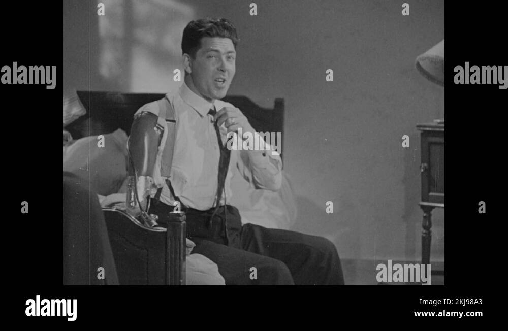 Male arm amputee demonstrates ability to tie a tie, talking about job ...