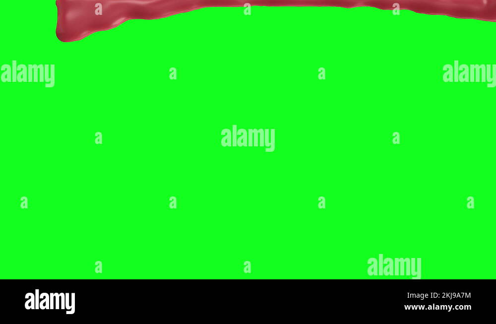 Ketchup flows down from the surface on green screen or chroma key ...
