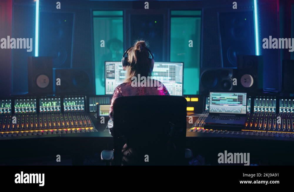 Audio Producer Uses Control Desk for Recording New Album Track in ...