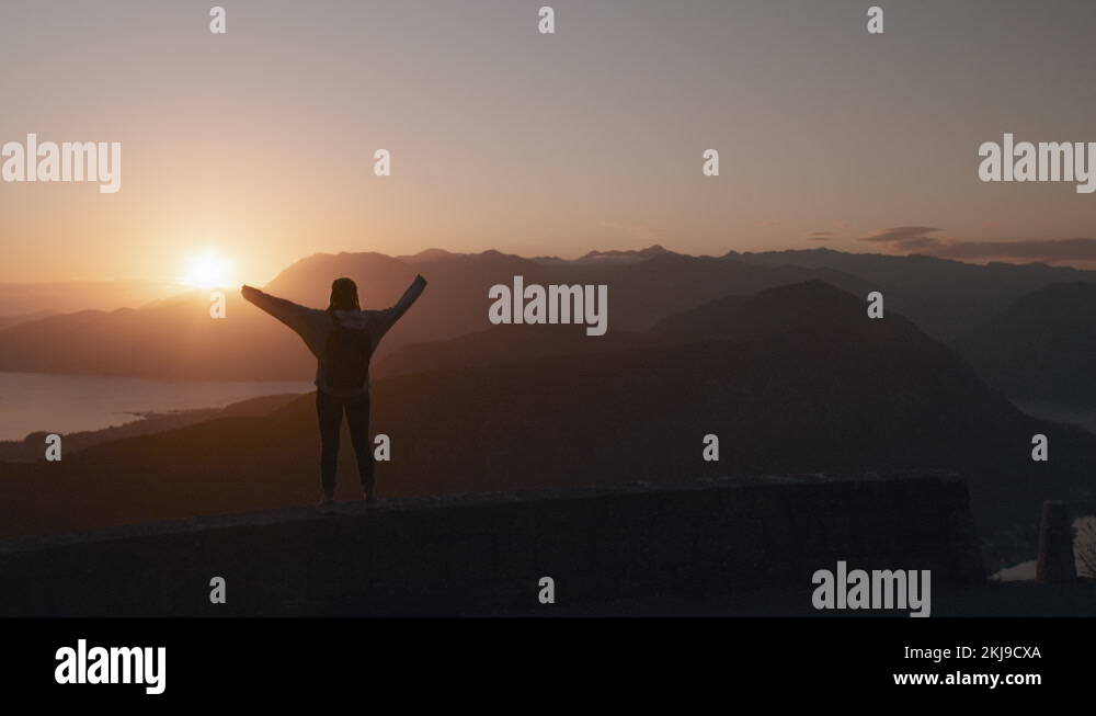 Silhouette woman hands up standing Stock Videos & Footage - HD and 4K ...