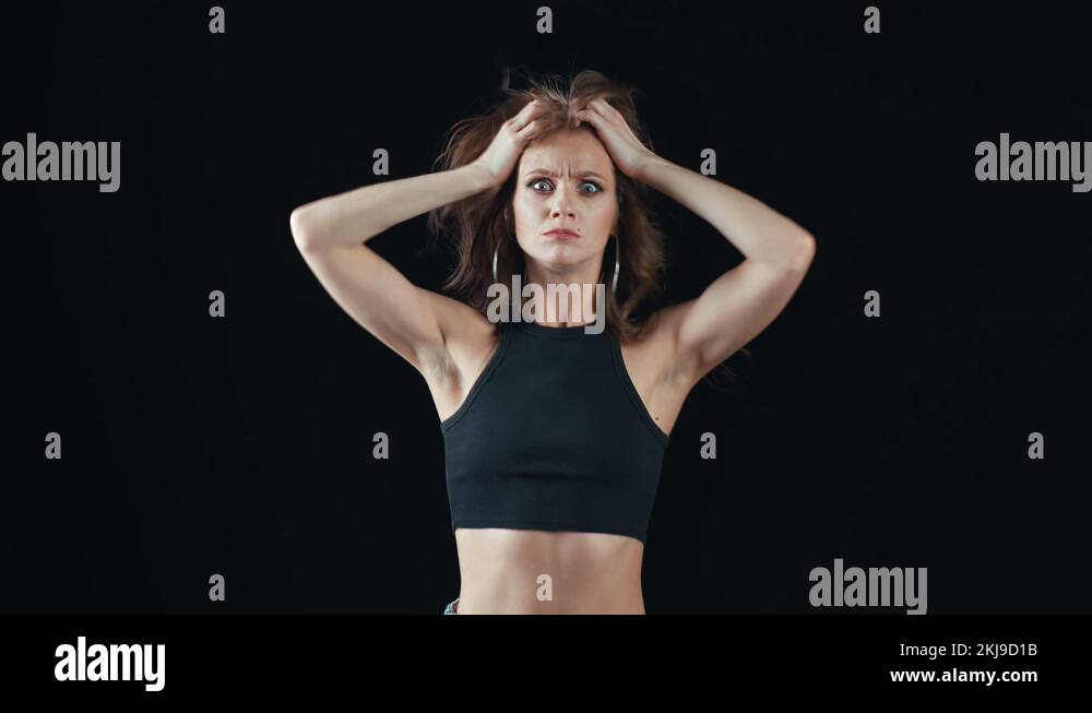 Funny female model demonstrating different pose during shooting at ...