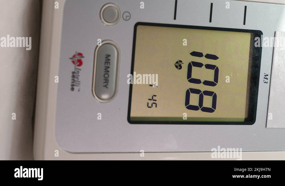 A closer look of the numbers going up from the blood pressure monitor ...