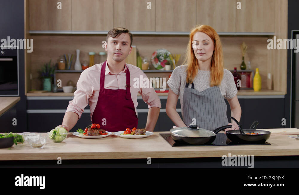 Cooking show hosts finishing cooking show and saying goodbye to the ...