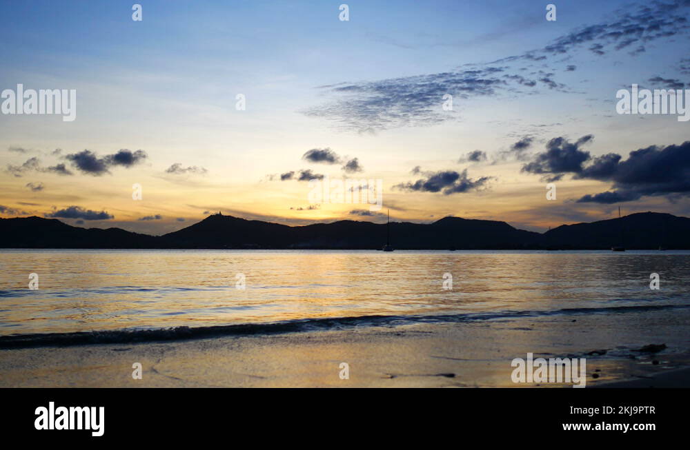 moving sea wave water hit sand beach, yacht sailboat mooring in sea ...