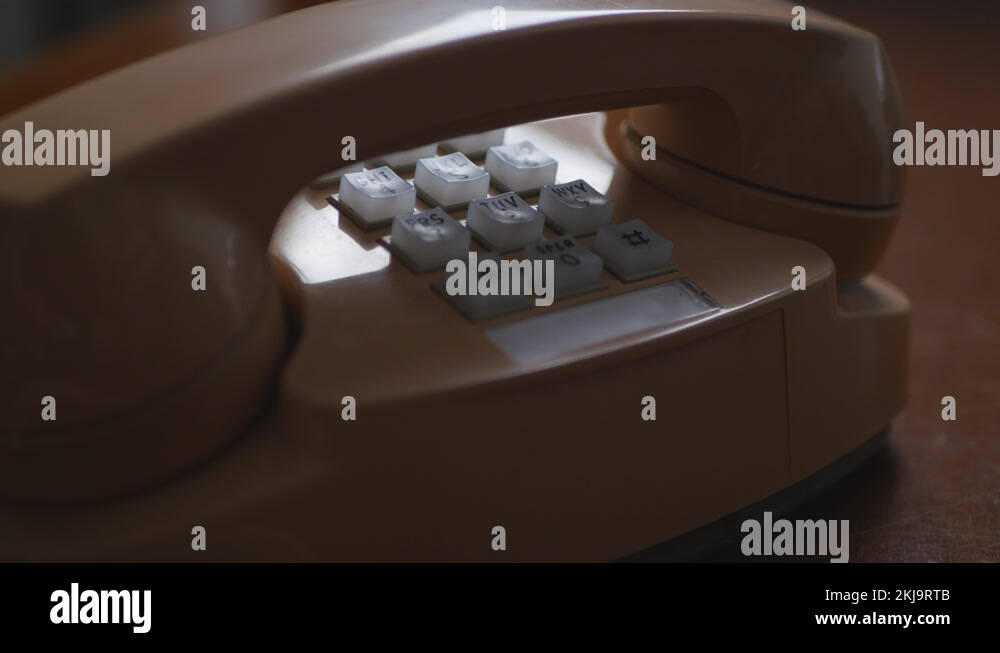 Elderly Man Dialing 911 Number Buttons On Retro Push Dial Telephone ...