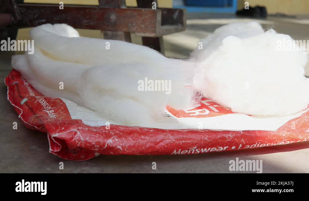 Fluffy cotton ready to be used in the manufacturing process for ...