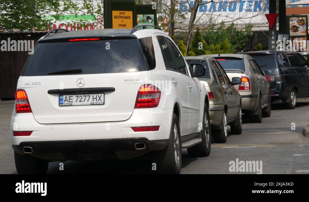 Cars in line to open McDonalds fast-food restaurant. Cafe sells ...