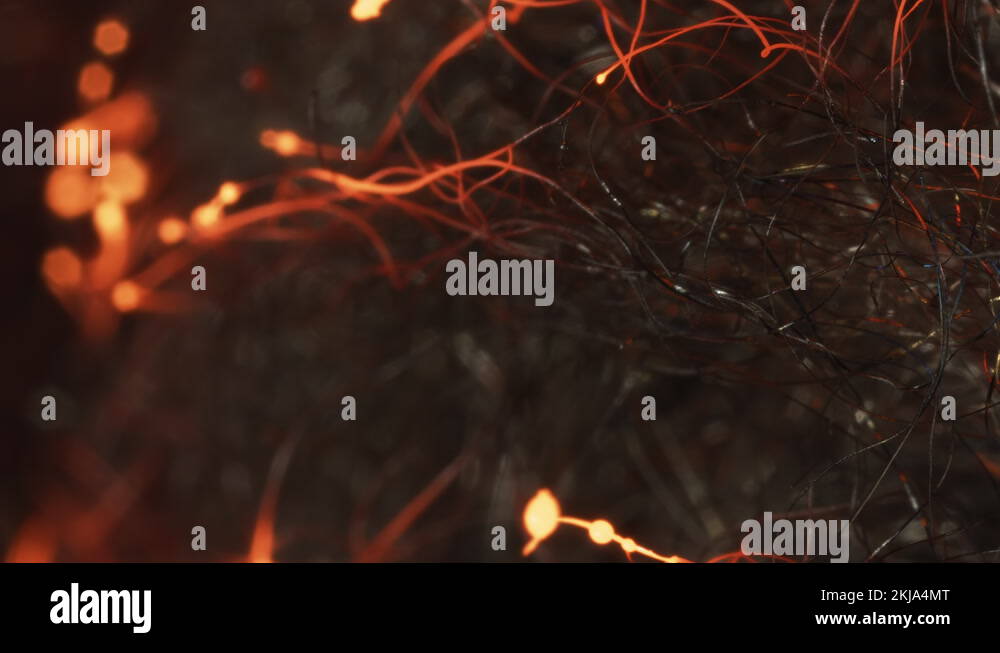 Macro footage of hot glowing metal filaments burning. VJ DJ Background ...